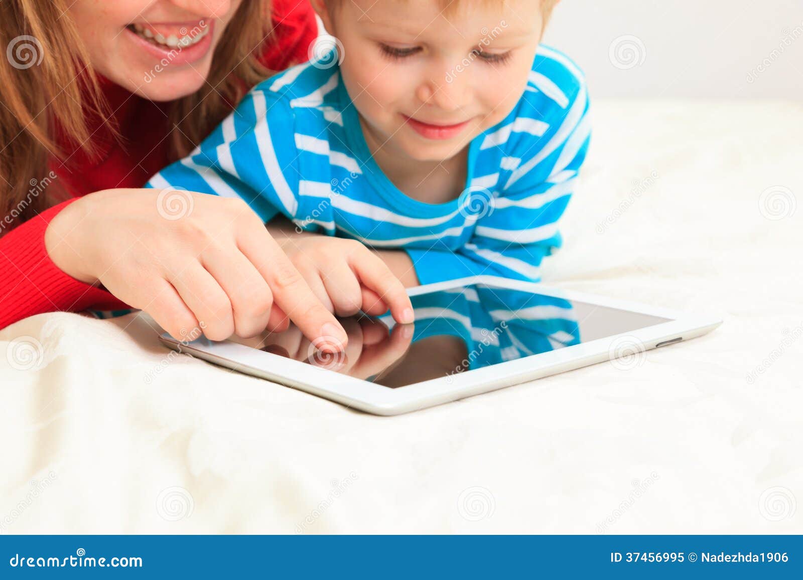 Family with Touch Pad at Home Stock Image - Image of family, little ...