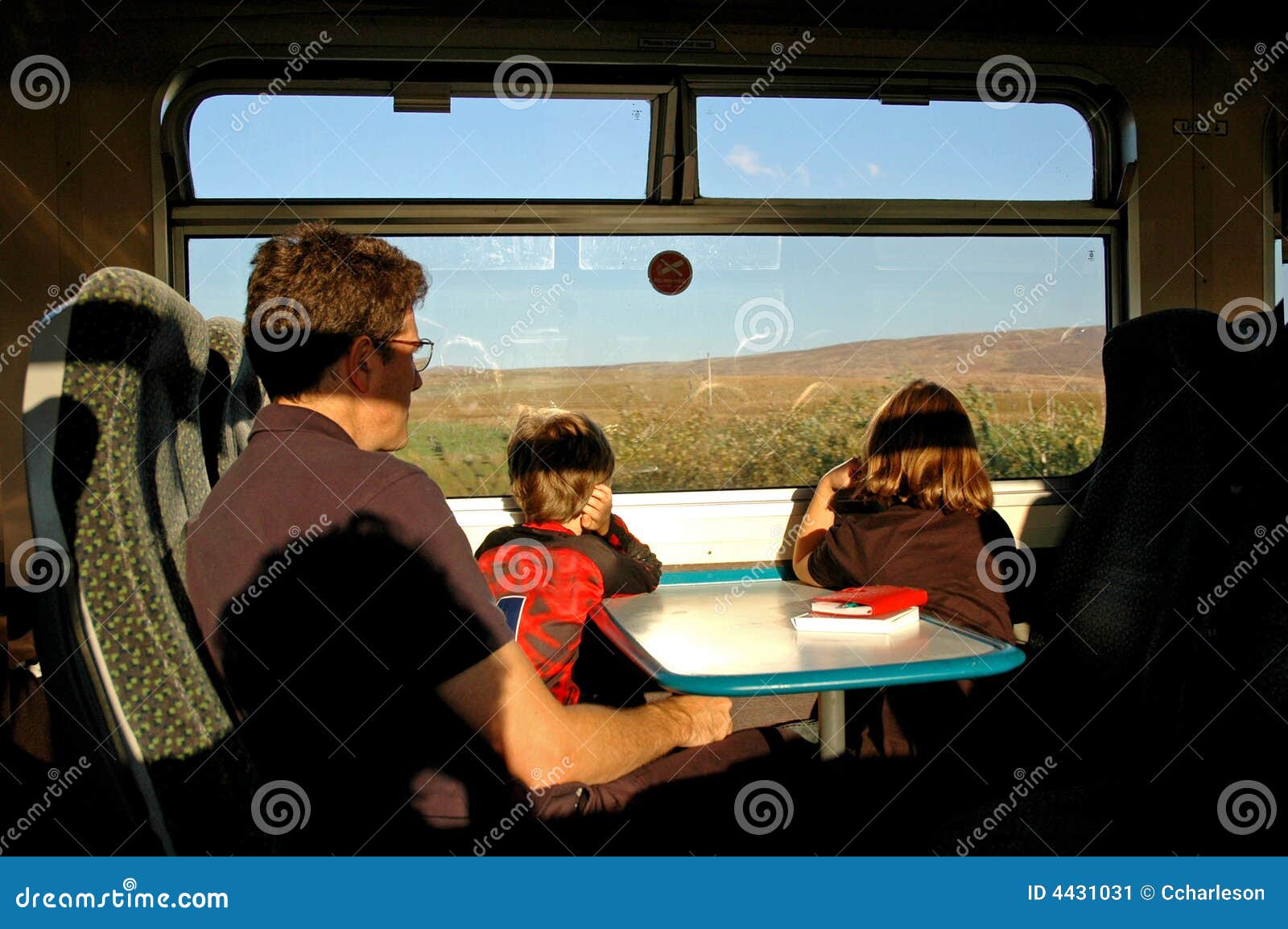 Family Travelling on a Train Stock Image - Image of kids, england: 4431031