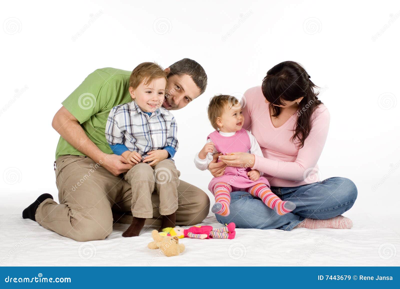 Family with two children stock image. Image of sitting - 7443679