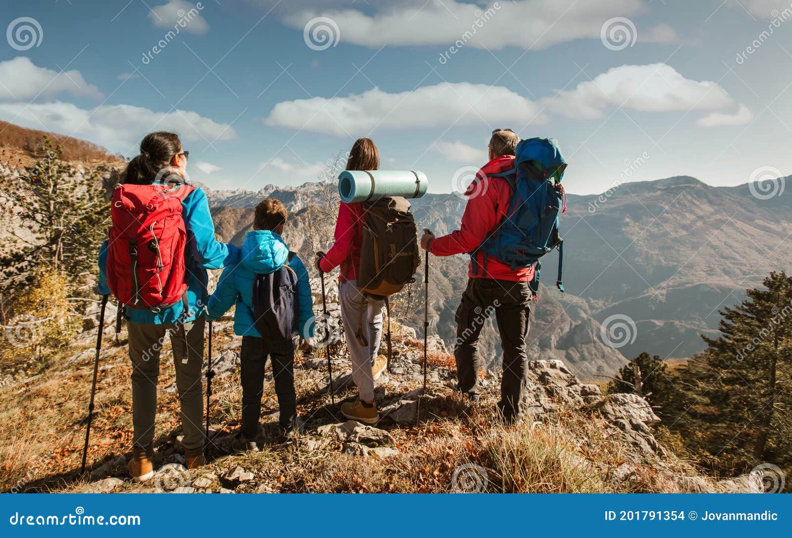 Family with Two Kids Hiking in Mountains Stock Photo - Image of active ...
