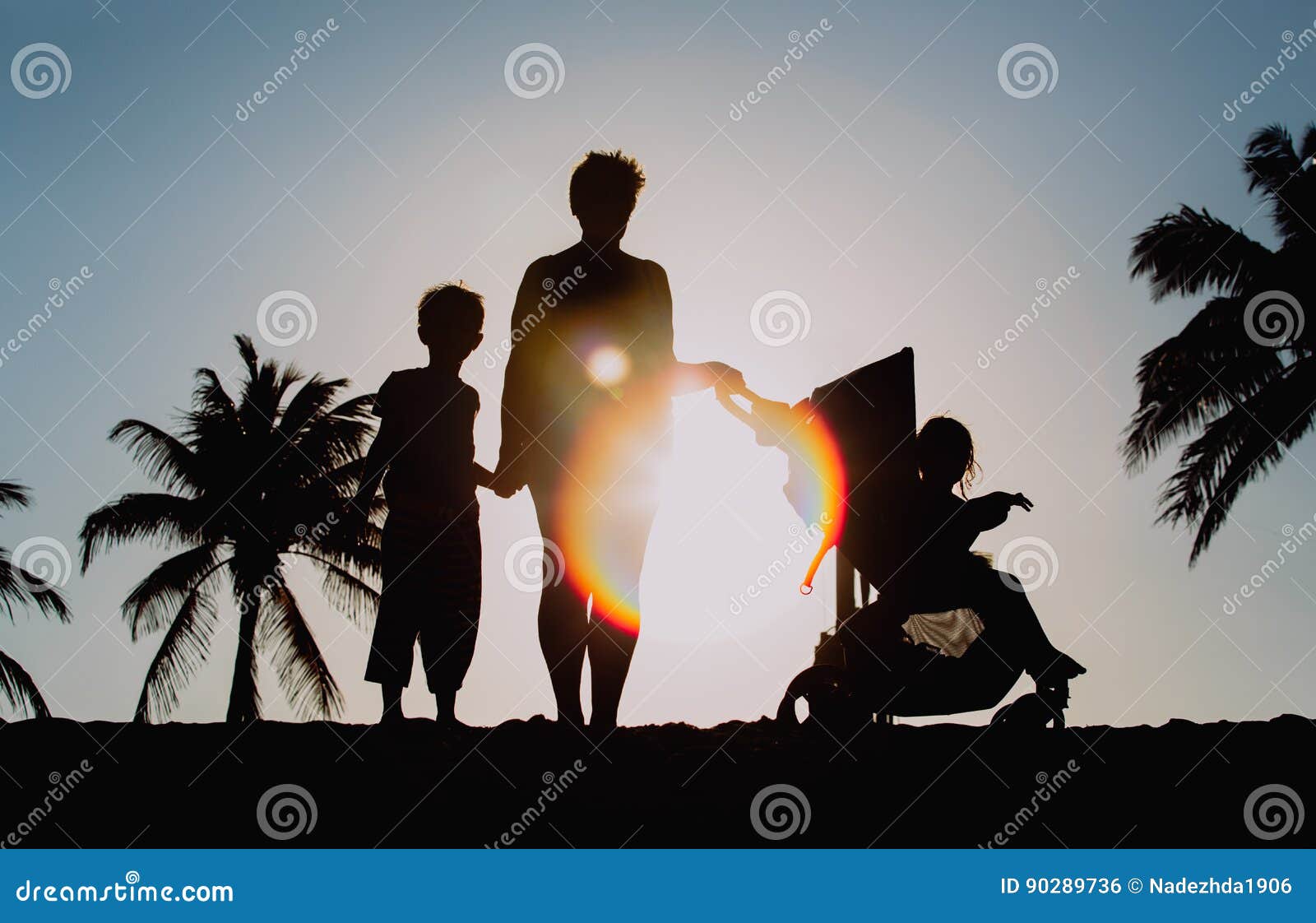 Family with Two Kids on Sunset Beach Stock Photo - Image of family ...
