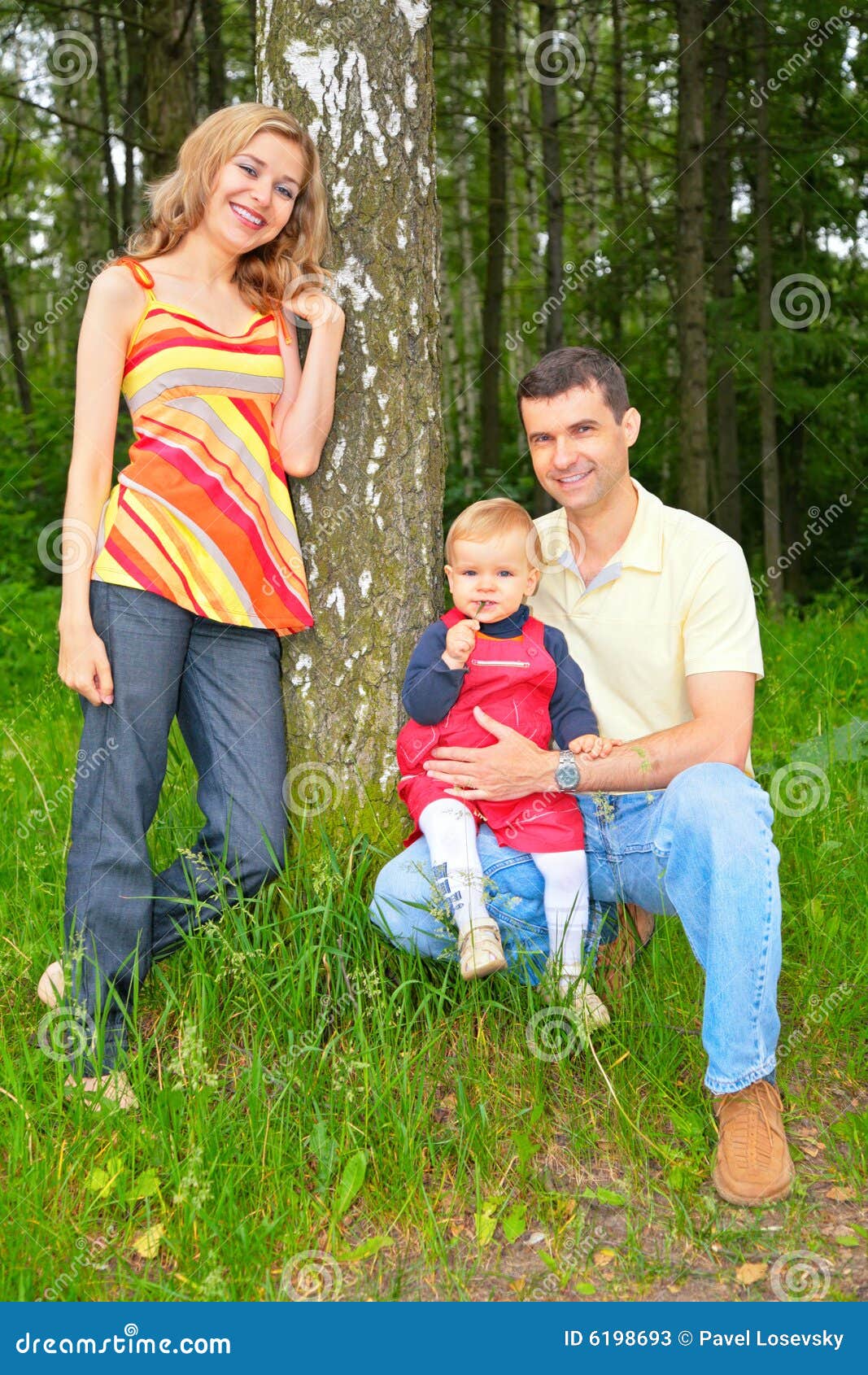 Family Under a Tree in Park Stock Image - Image of lifestyles ...