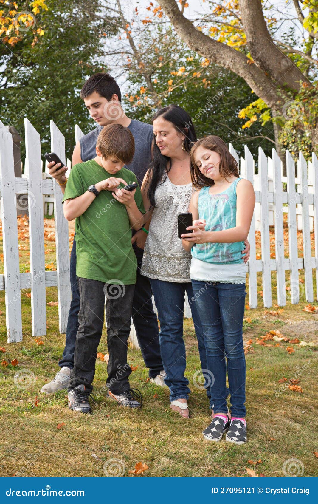 Family using Cellphones stock image. Image of electronics - 27095121