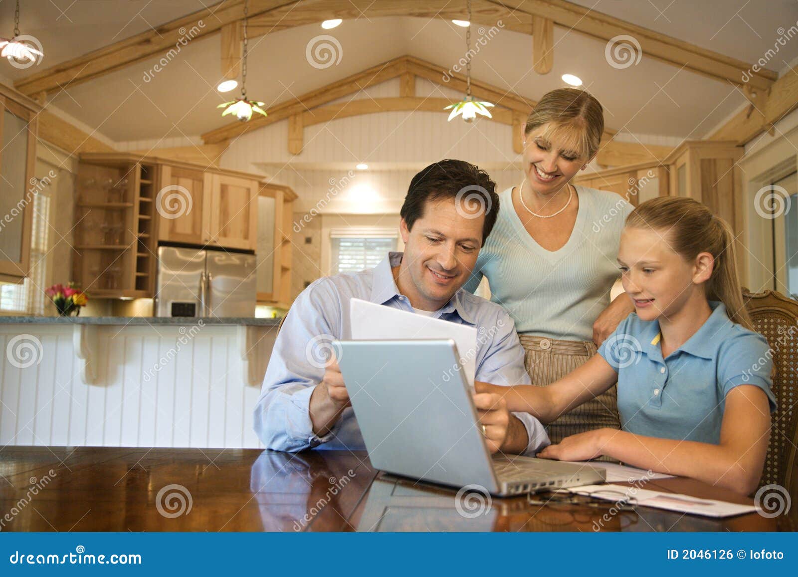 Family using computer stock photo. Image of laptop, schoolwork - 2046126