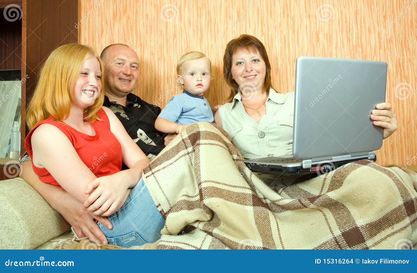 Family using laptop stock photo. Image of home, adult - 15316264