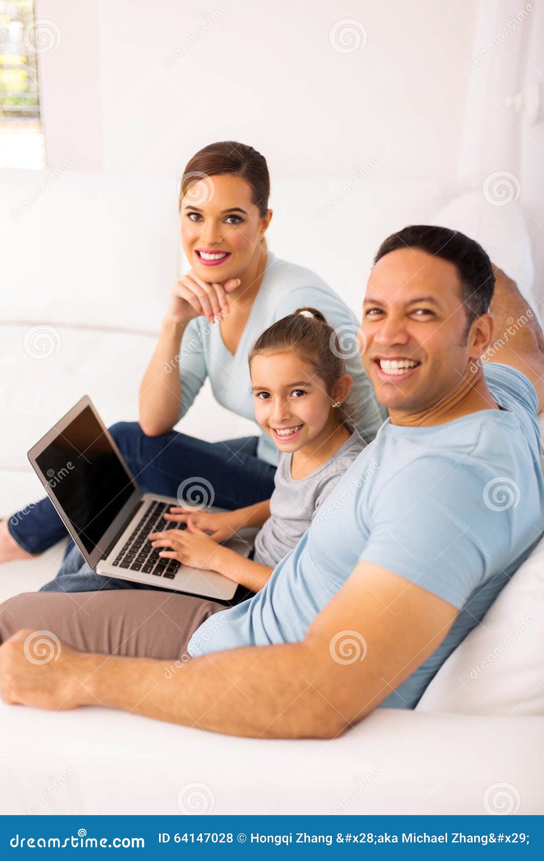 Family Using Laptop Computer Stock Photo - Image of looking, family ...