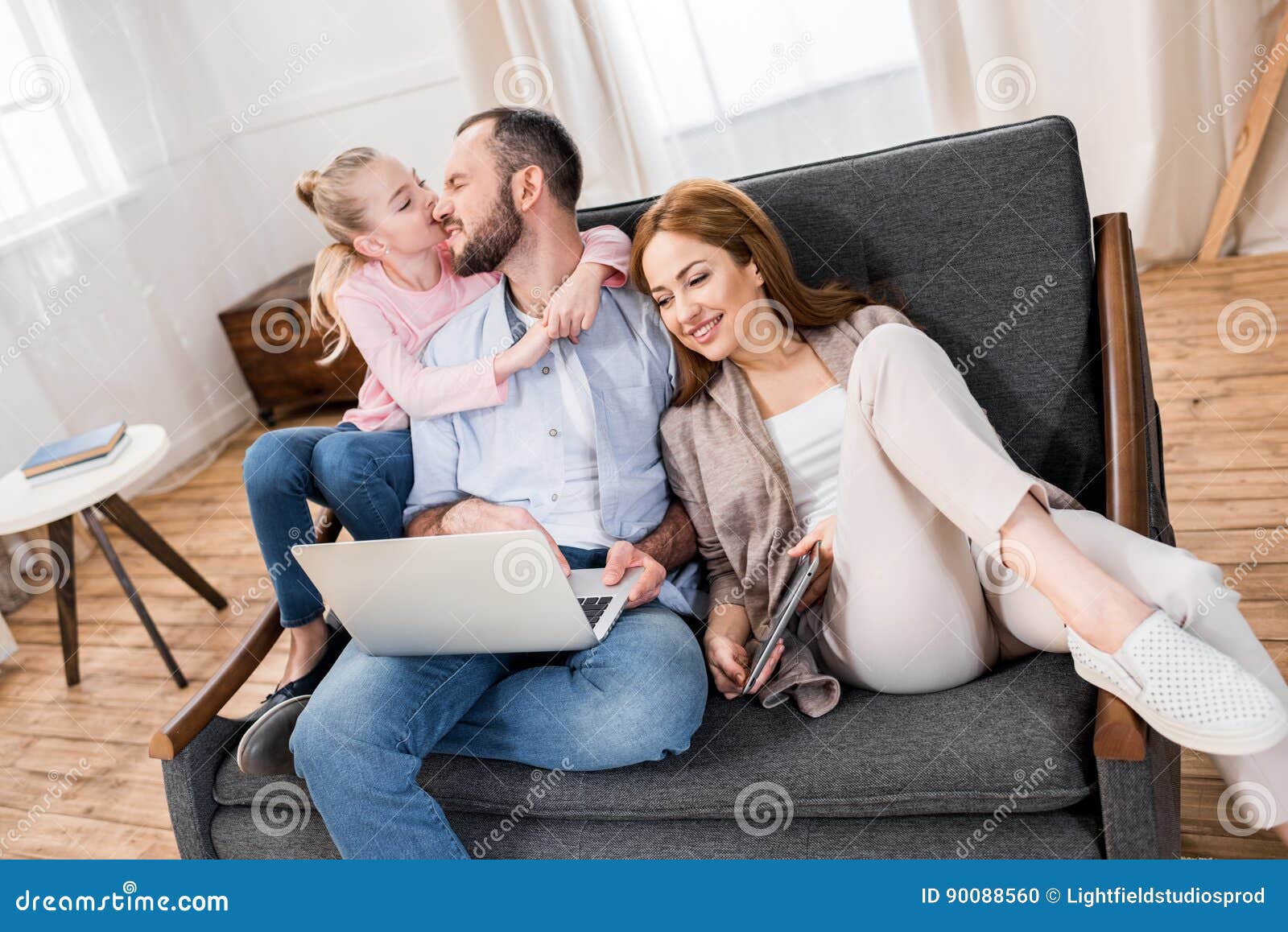 Family using laptop stock photo. Image of caucasian, hugging - 90088560