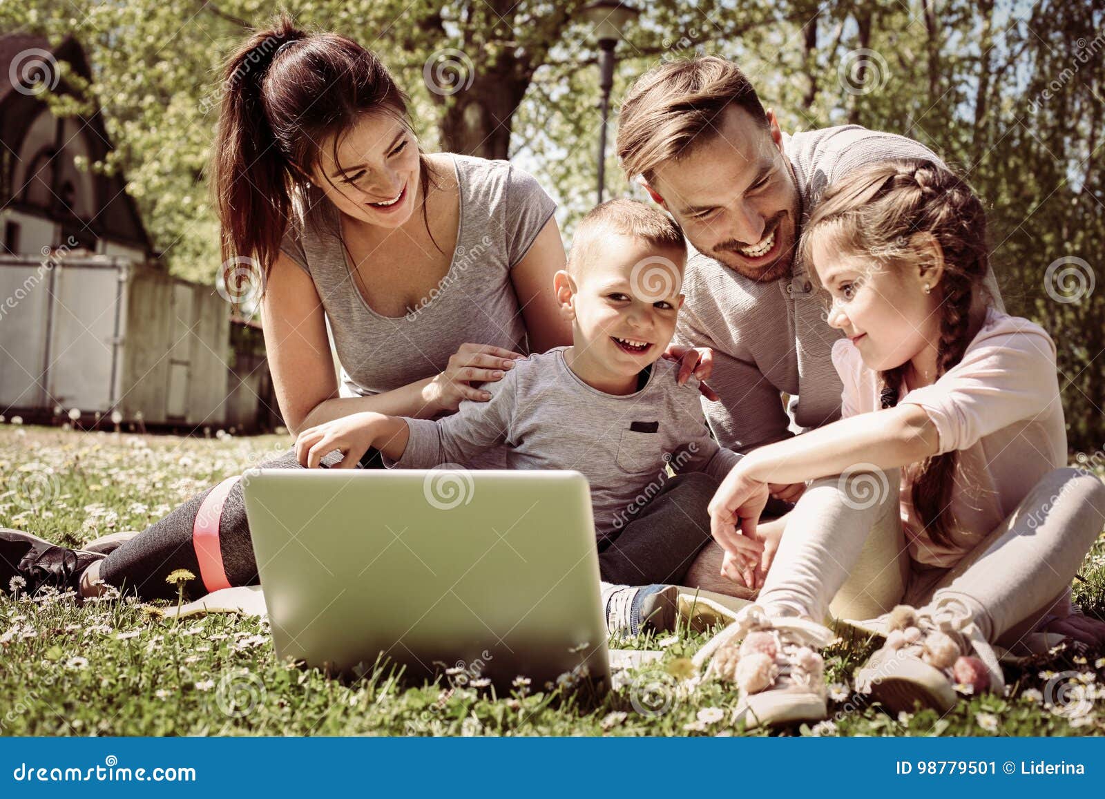 Family using laptop. stock image. Image of four, daughter - 98779501