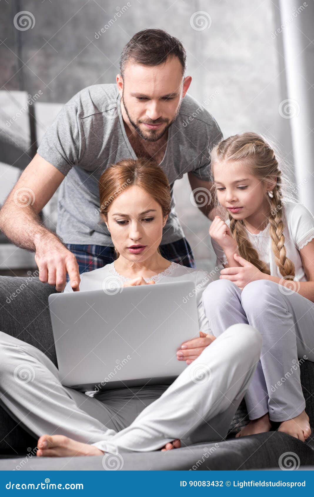 Family using laptop stock photo. Image of mommy, parenting - 90083432