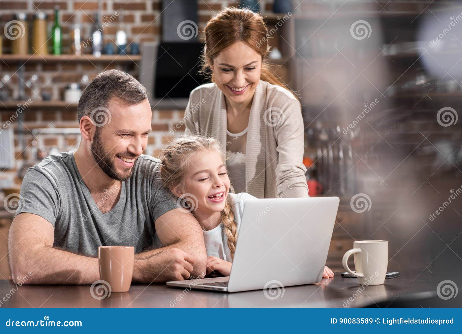 Family using laptop stock image. Image of laughing, father - 90083589
