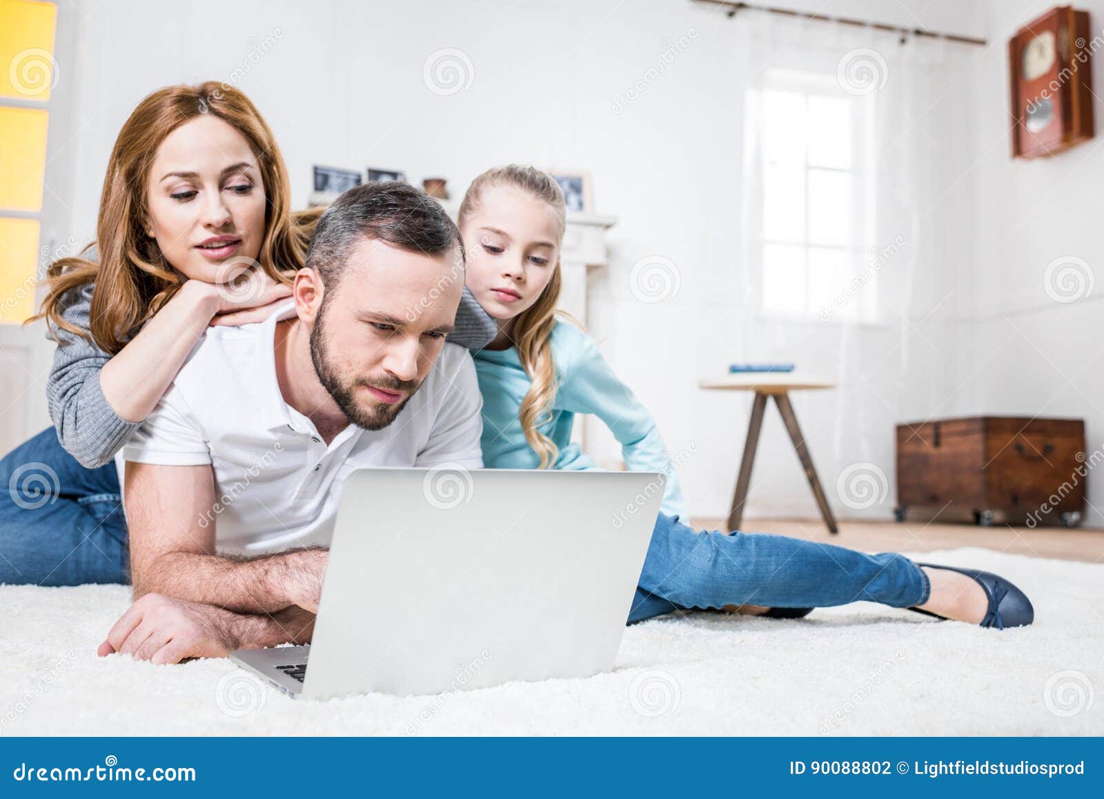 Family using laptop stock photo. Image of embrace, parents - 90088802