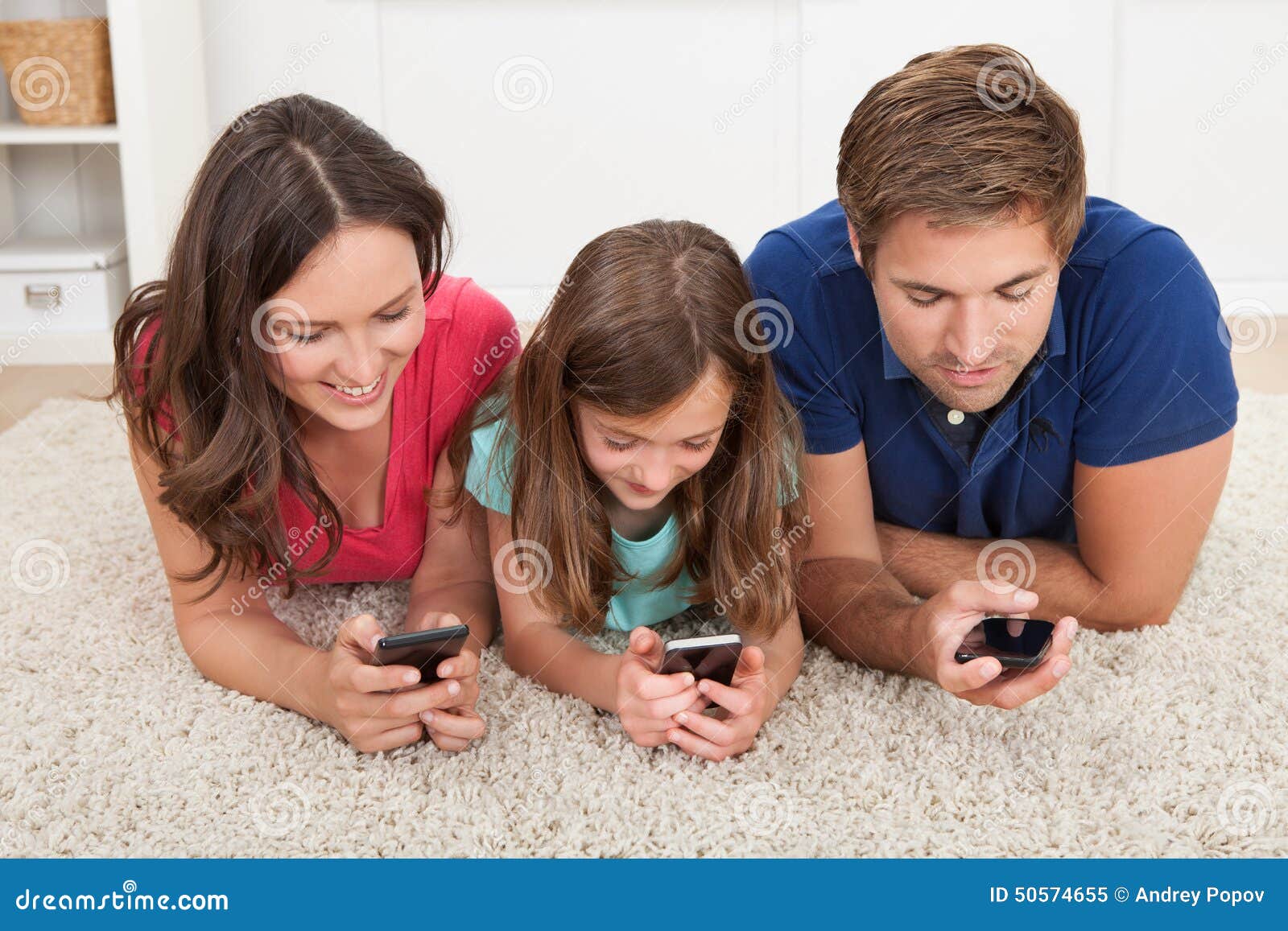 Family Using Smart Phones at Home Stock Image - Image of relaxation ...
