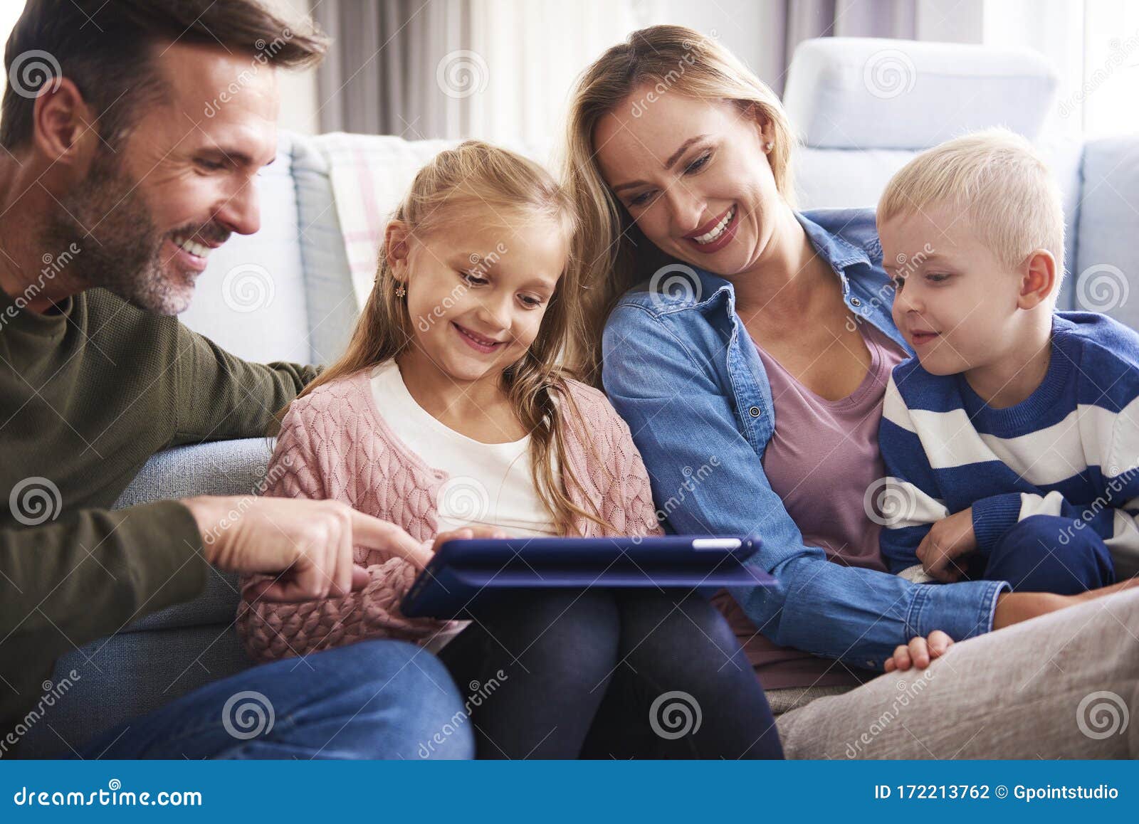 Family using a tablet stock photo. Image of horizontal - 172213762