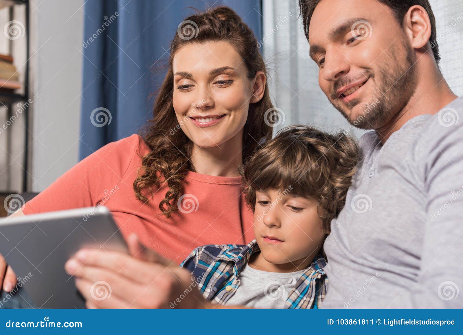 Family using tablet stock image. Image of child, mother - 103861811