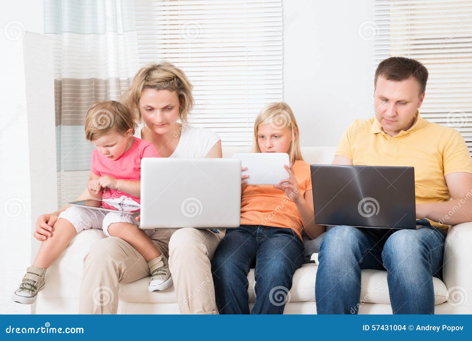 Family Using Tablets and Computers Stock Photo - Image of indoors ...