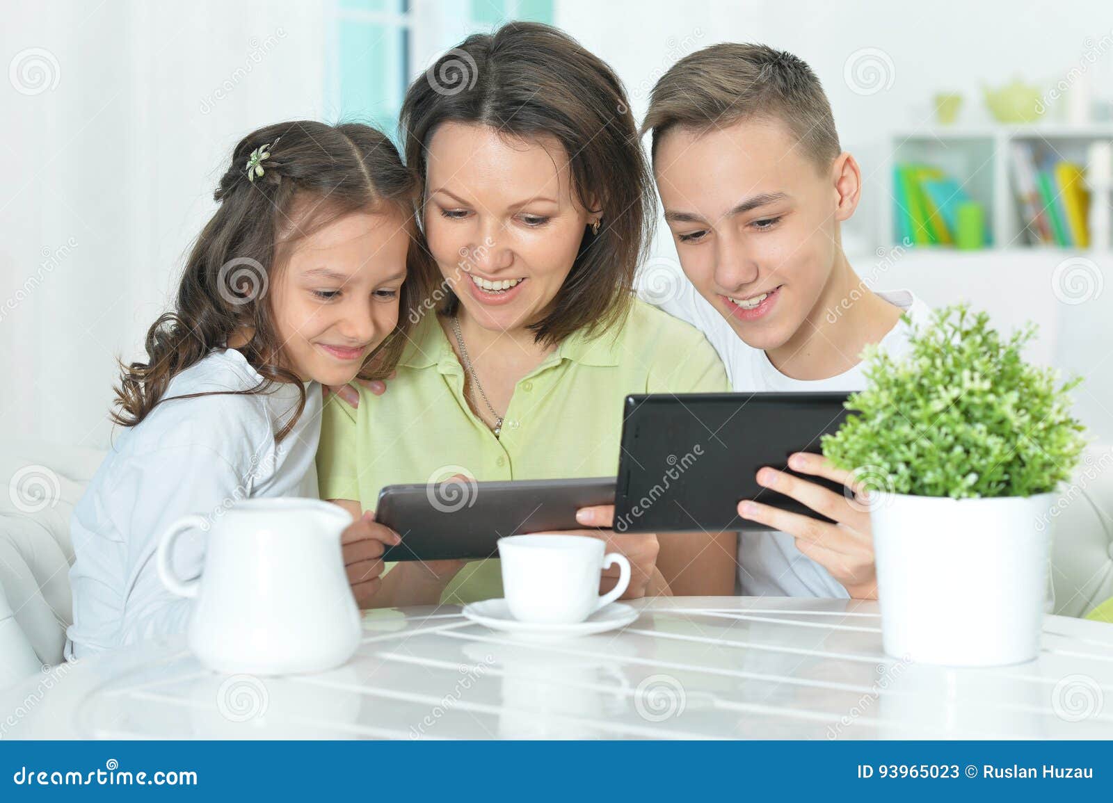 Family using tablets stock image. Image of human, consolidation - 93965023