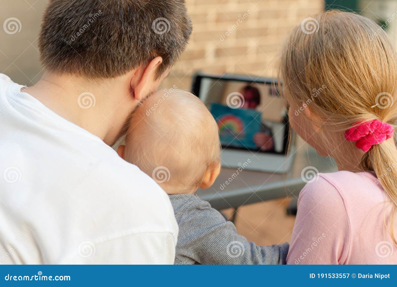 Family Video Chat - a Man with Two Children Using Tablet for ...