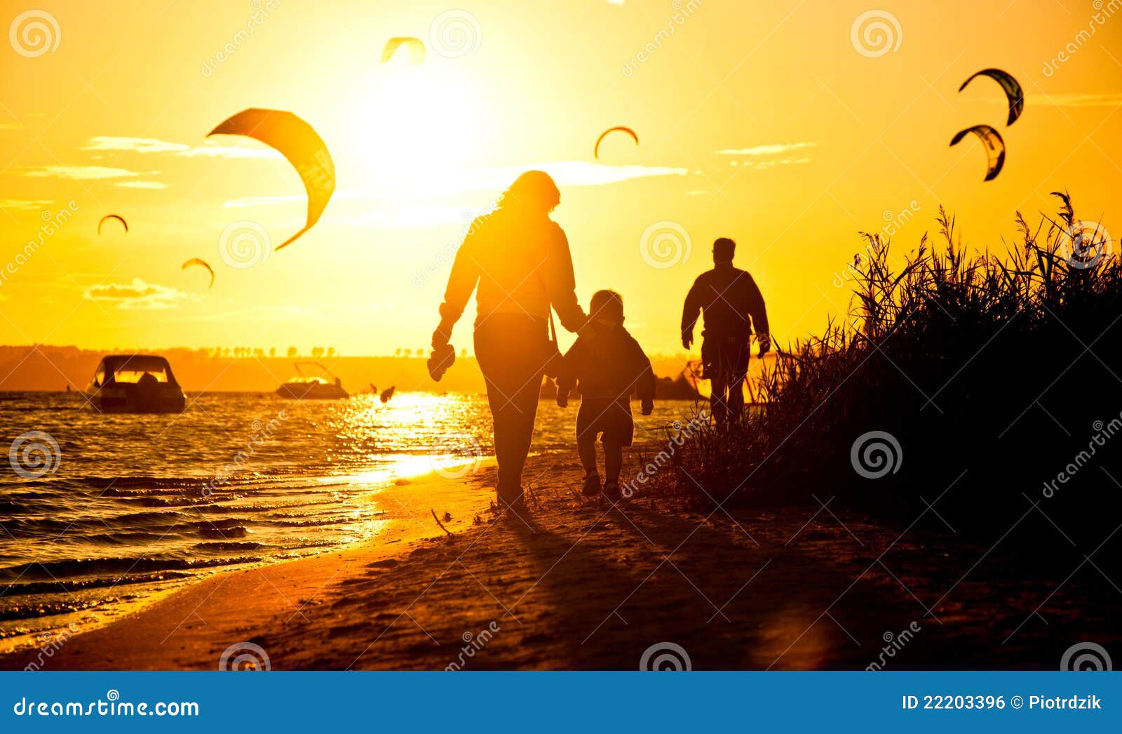 Family walk on sunset stock photo. Image of coast, sunset - 22203396