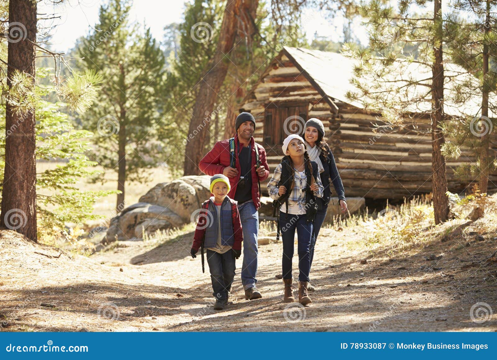 Family Walking Away from a Log Cabin in a Forest Stock Image - Image of ...
