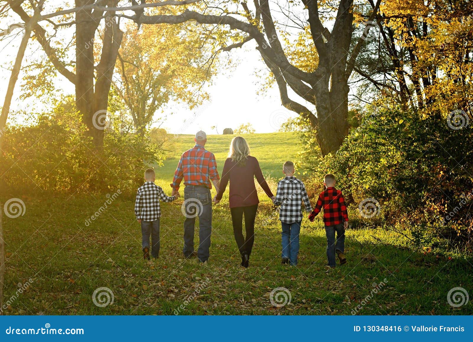 Family walking stock photo. Image of walking, setting - 130348416