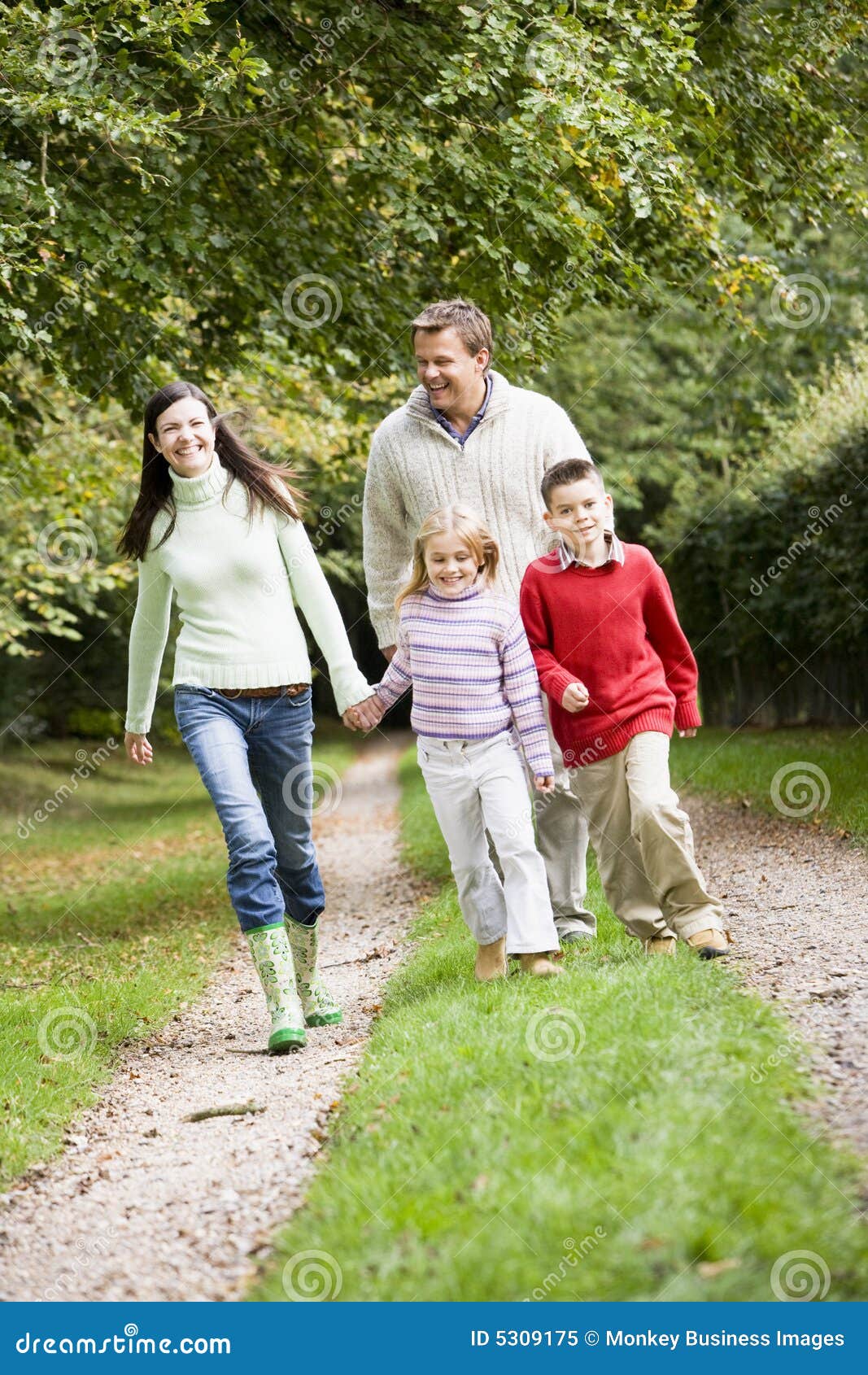 Family Walking through Countryside Stock Image - Image of outside, path ...