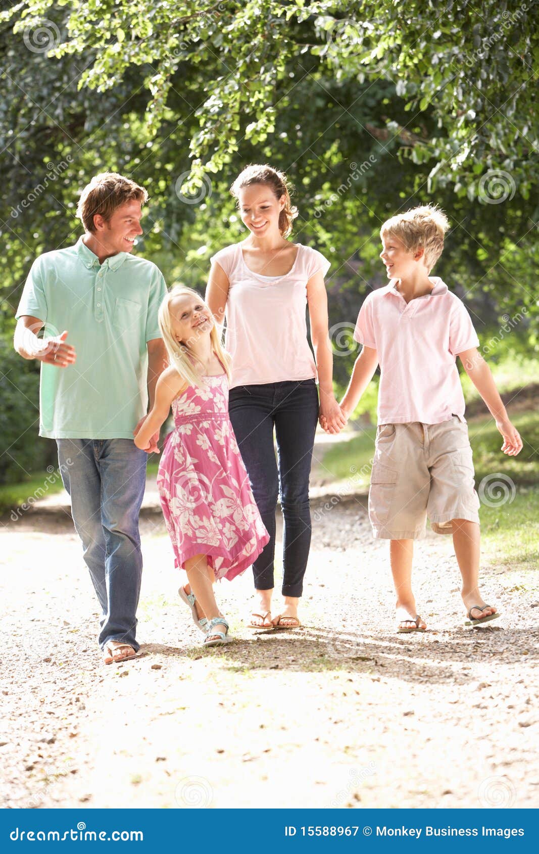 Family Walking in Countryside Together Stock Image - Image of girl ...