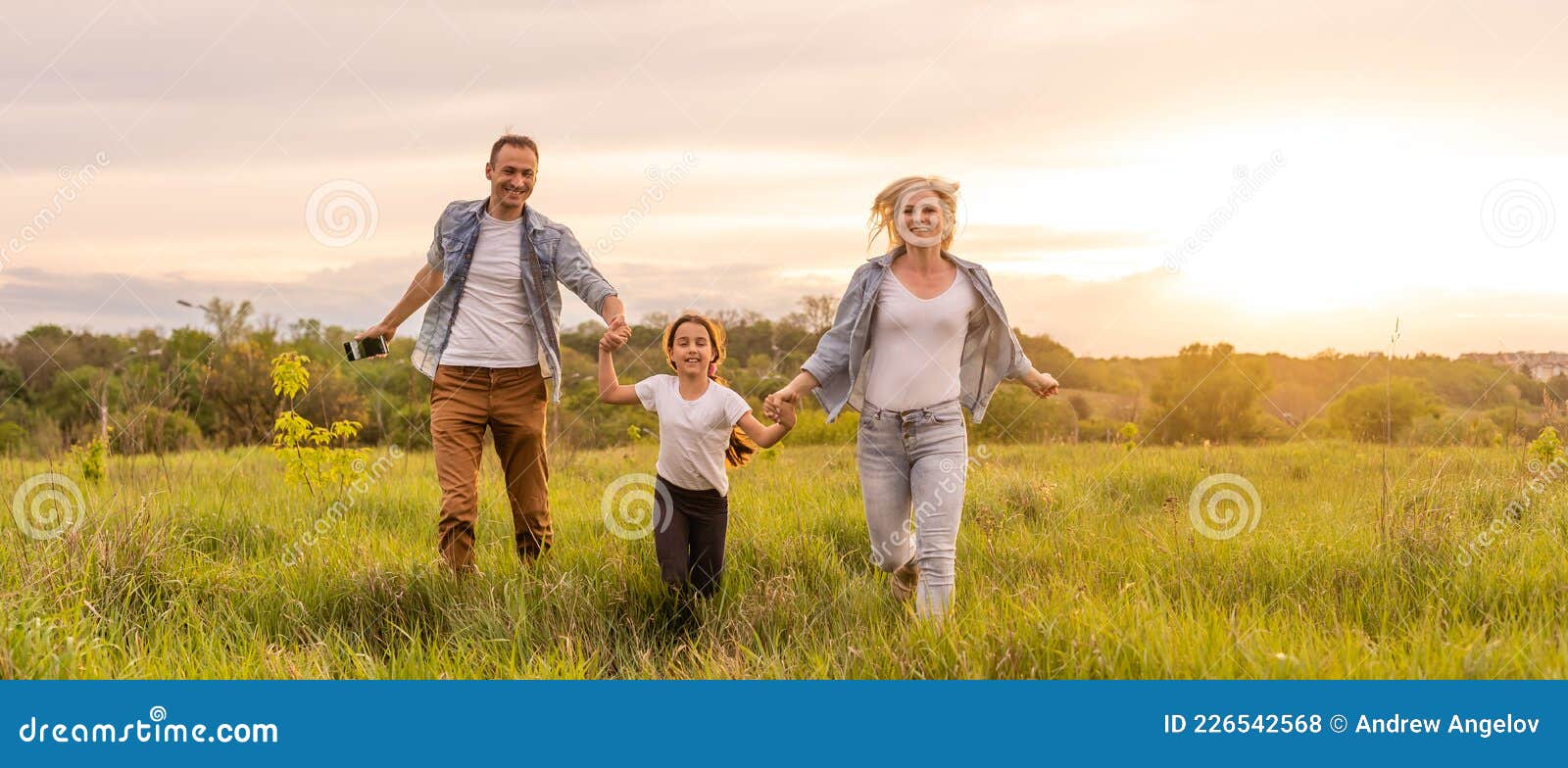 Family is Walking in a Field Stock Photo - Image of together, nature ...