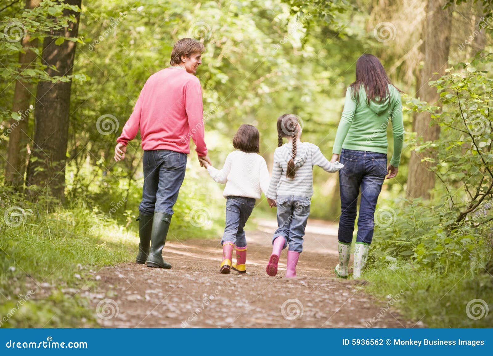 Family Walking on Path Holding Hands Stock Photo - Image of male, path ...