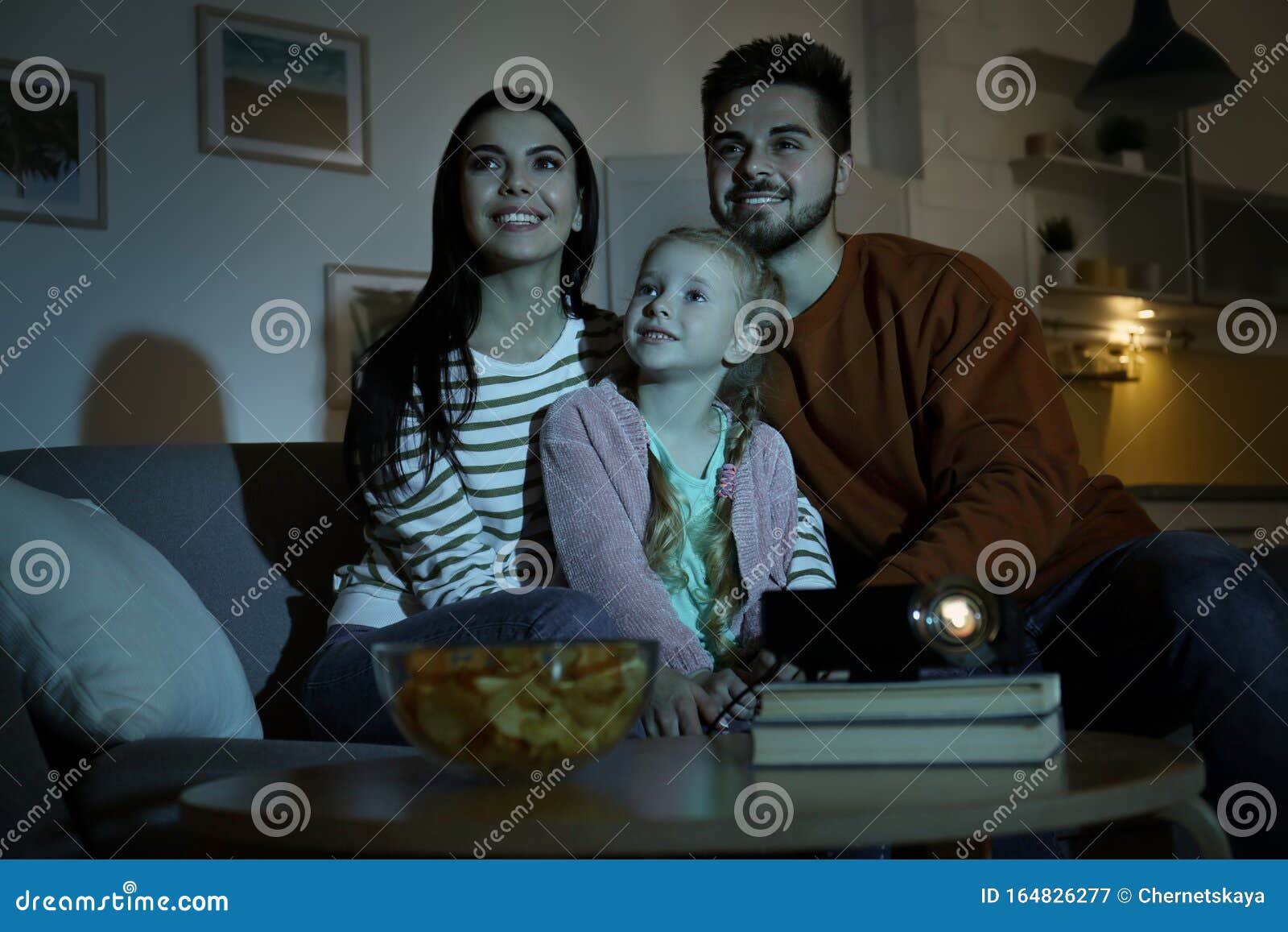 Family Watching Movie Using Video Projector Stock Image - Image of ...