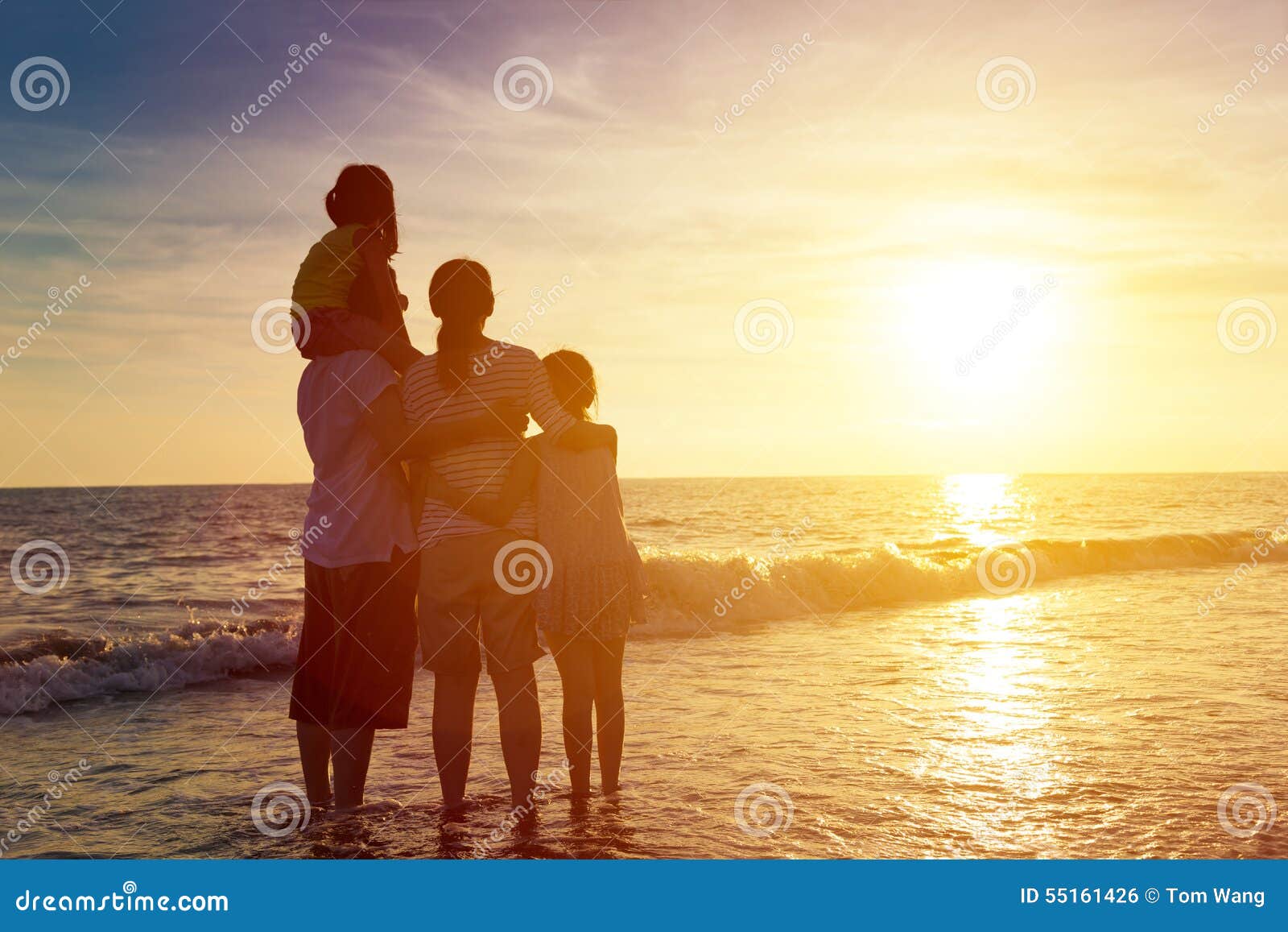 Family Watching the Sunset on the Beach Stock Photo - Image of outdoors ...