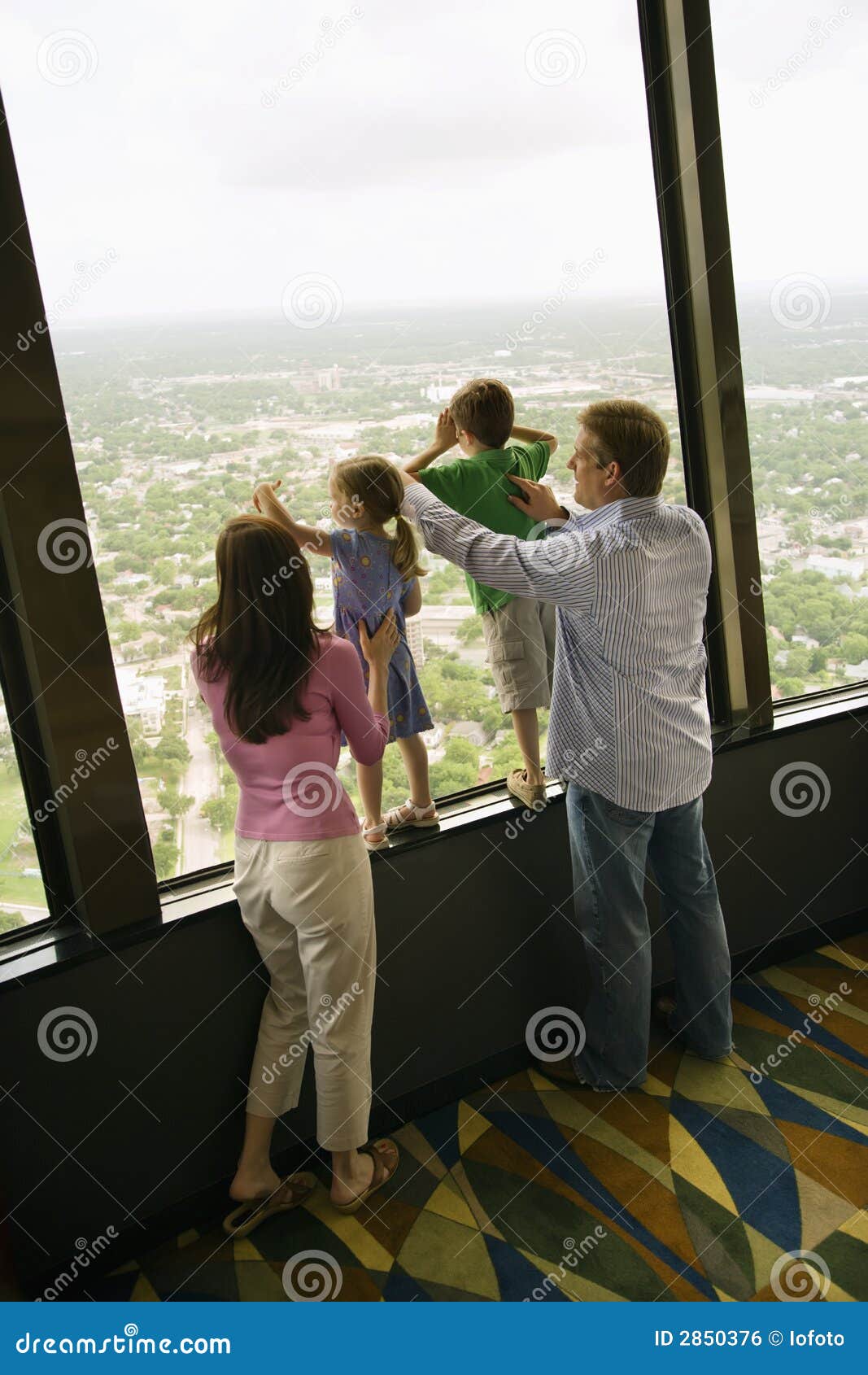 Family at window. stock photo. Image of americas, woman - 2850376