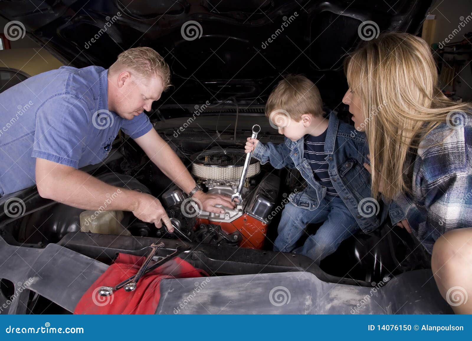 Family working on car stock photo. Image of person, motor - 14076150
