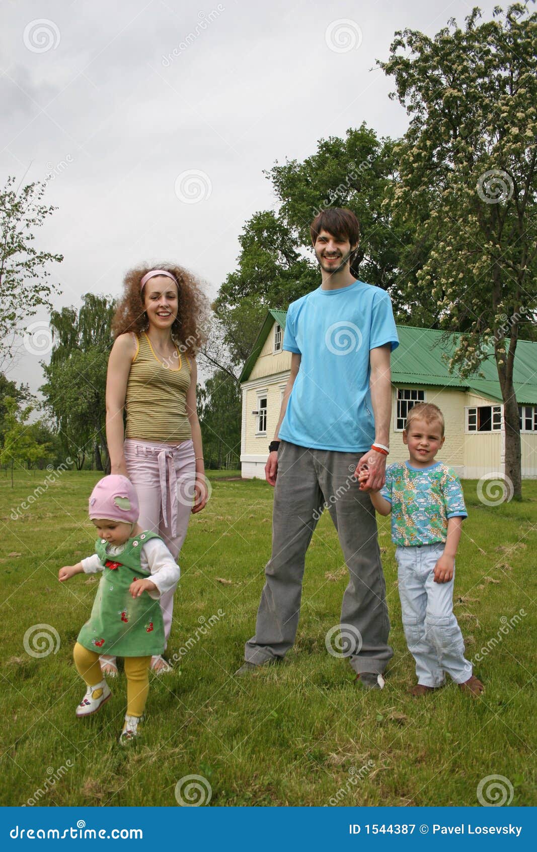 Family in yard stock image. Image of kids, four, real - 1544387