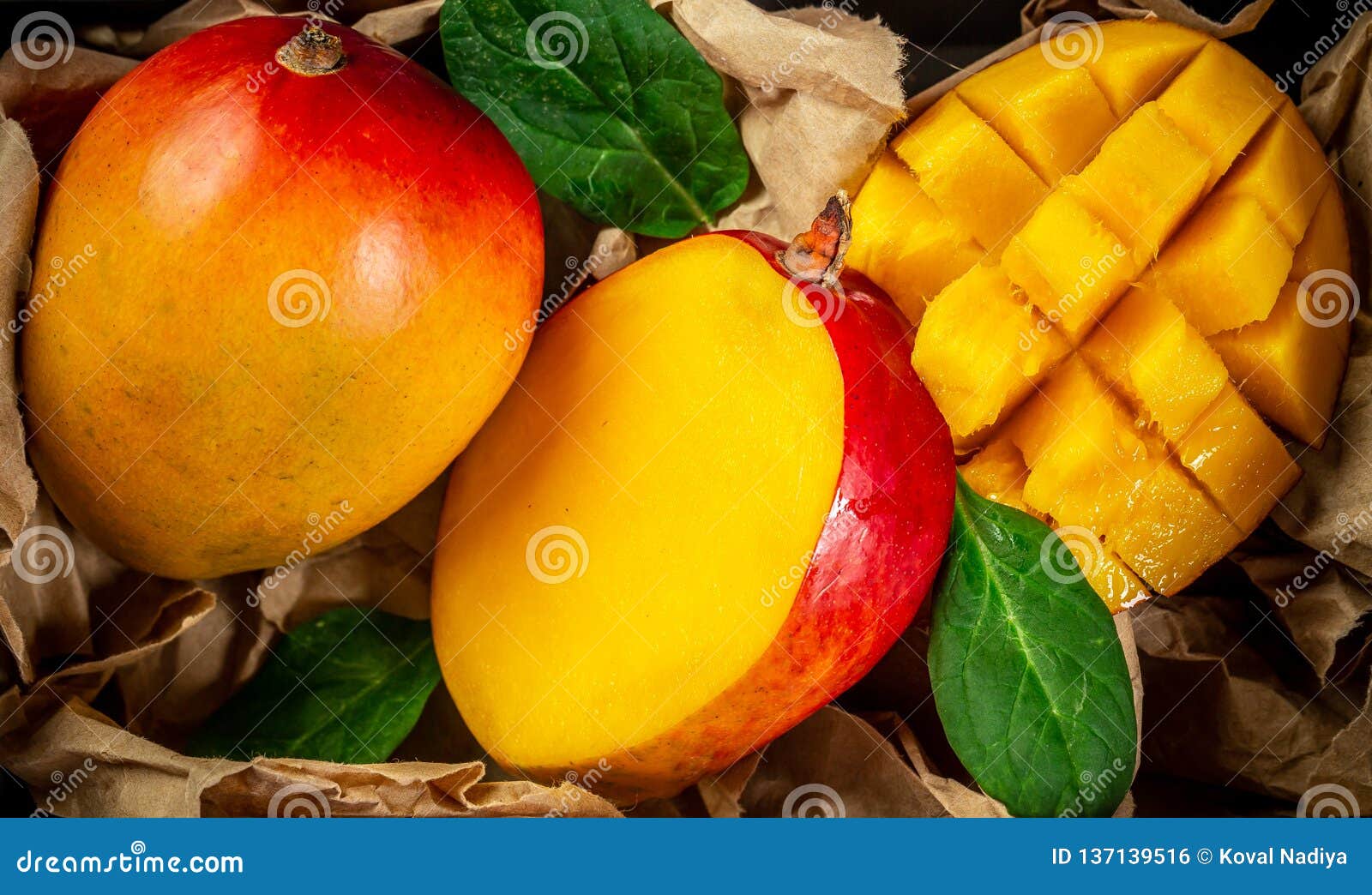 Famous Alphonso Mango Slices Over Wood Background, Top View Stock Photo ...