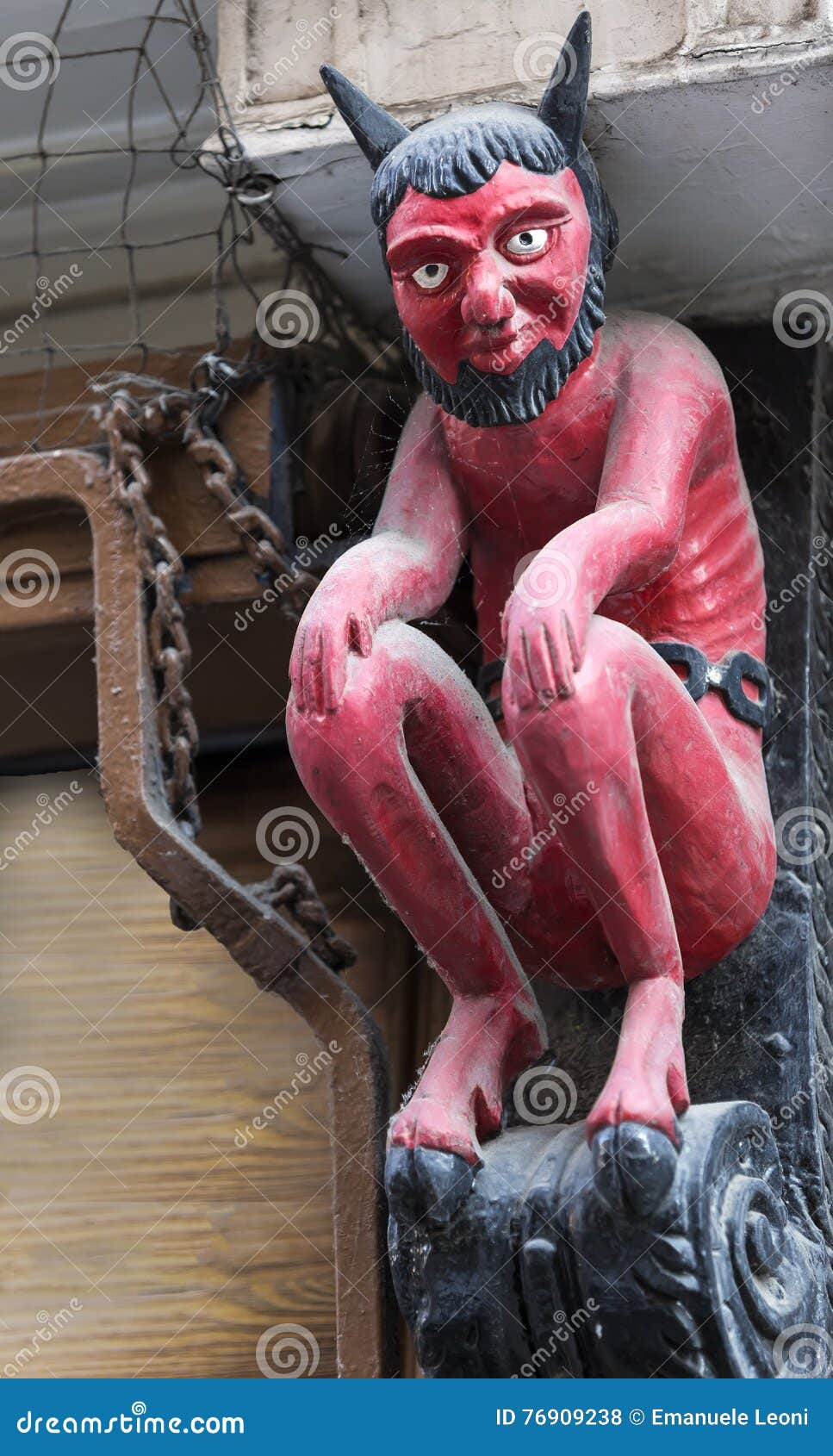 The Famous Little Red Devil Statue Located in Stonegate, York. Stock ...