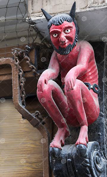 The Famous Little Red Devil Statue Located in Stonegate, York. Stock ...