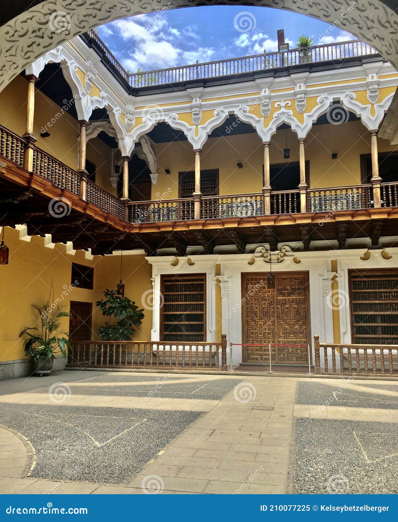 Fancy Building with Yellow Walls and Balcony Stock Image - Image of ...