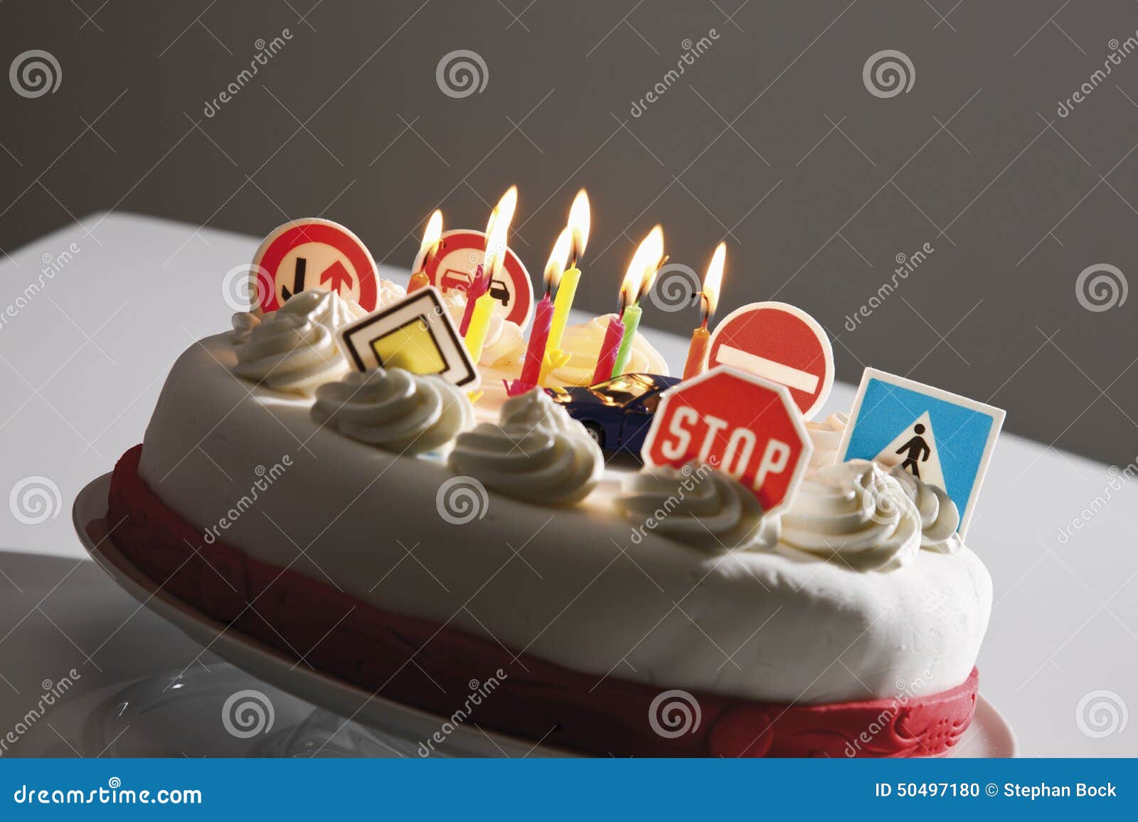 Fancy Cake with Road Signs and Burning Candles Stock Photo - Image of ...