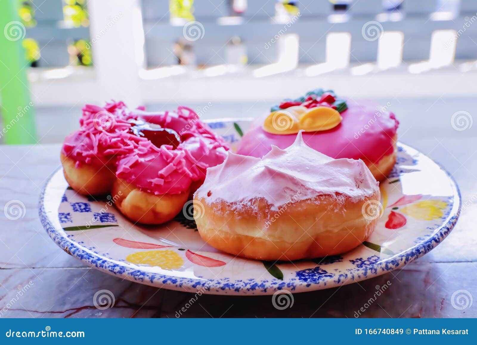 Fancy Donuts on a White Plate Stock Image - Image of donuts, closeup ...