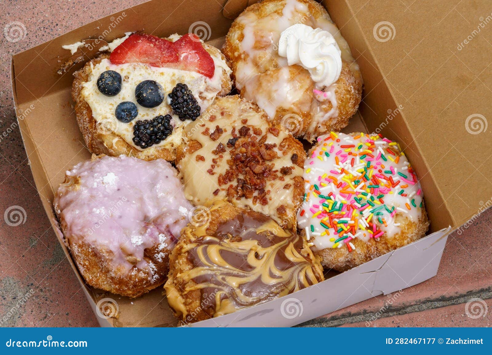Fancy Doughnuts Loaded with Toppings in a Box Stock Image - Image of ...