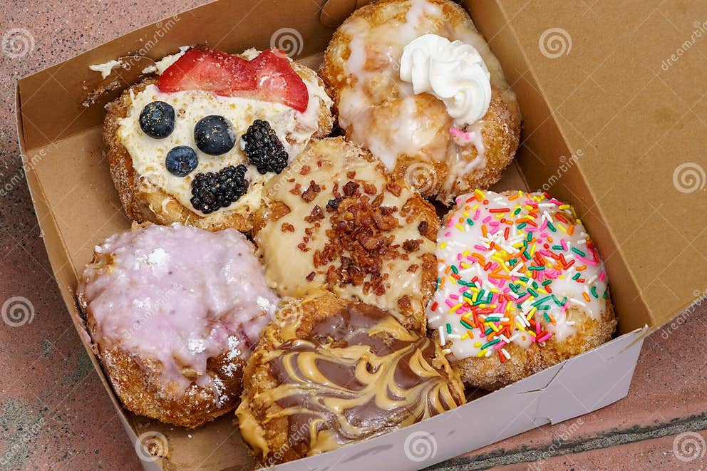 Fancy Doughnuts Loaded with Toppings in a Box Stock Image - Image of ...