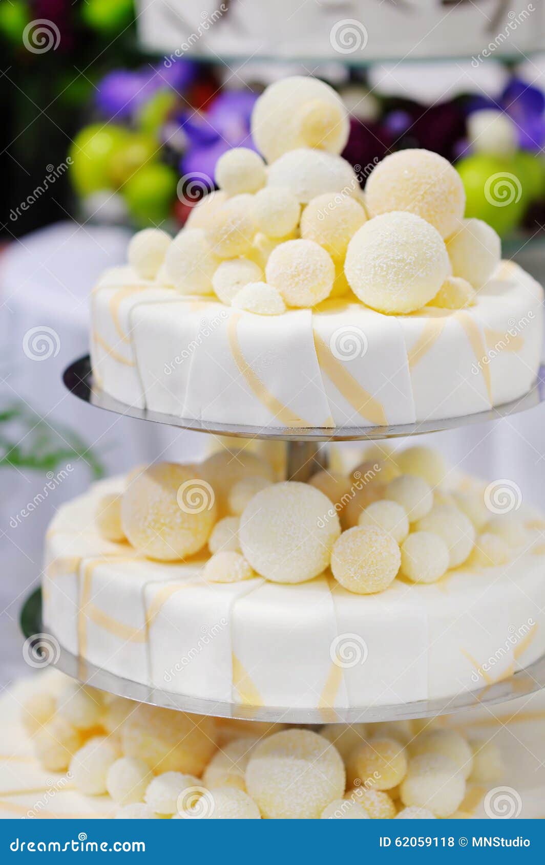 Fancy White and Yellow Wedding Cake Stock Photo - Image of dessert ...