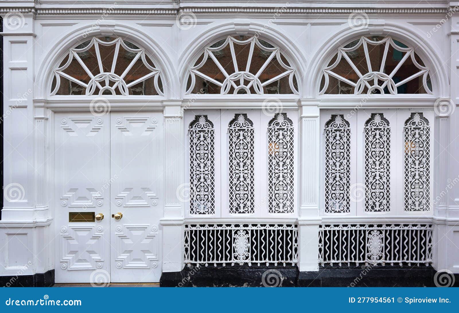 Fanlight Windows and Ornate Grille on Old Office Building Stock Image ...