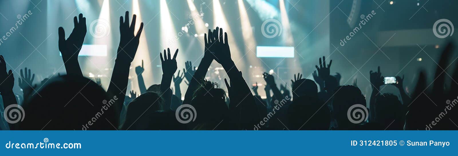 Fans with Hands Up, Blurred Stage Backdrop, Candid Energy ...
