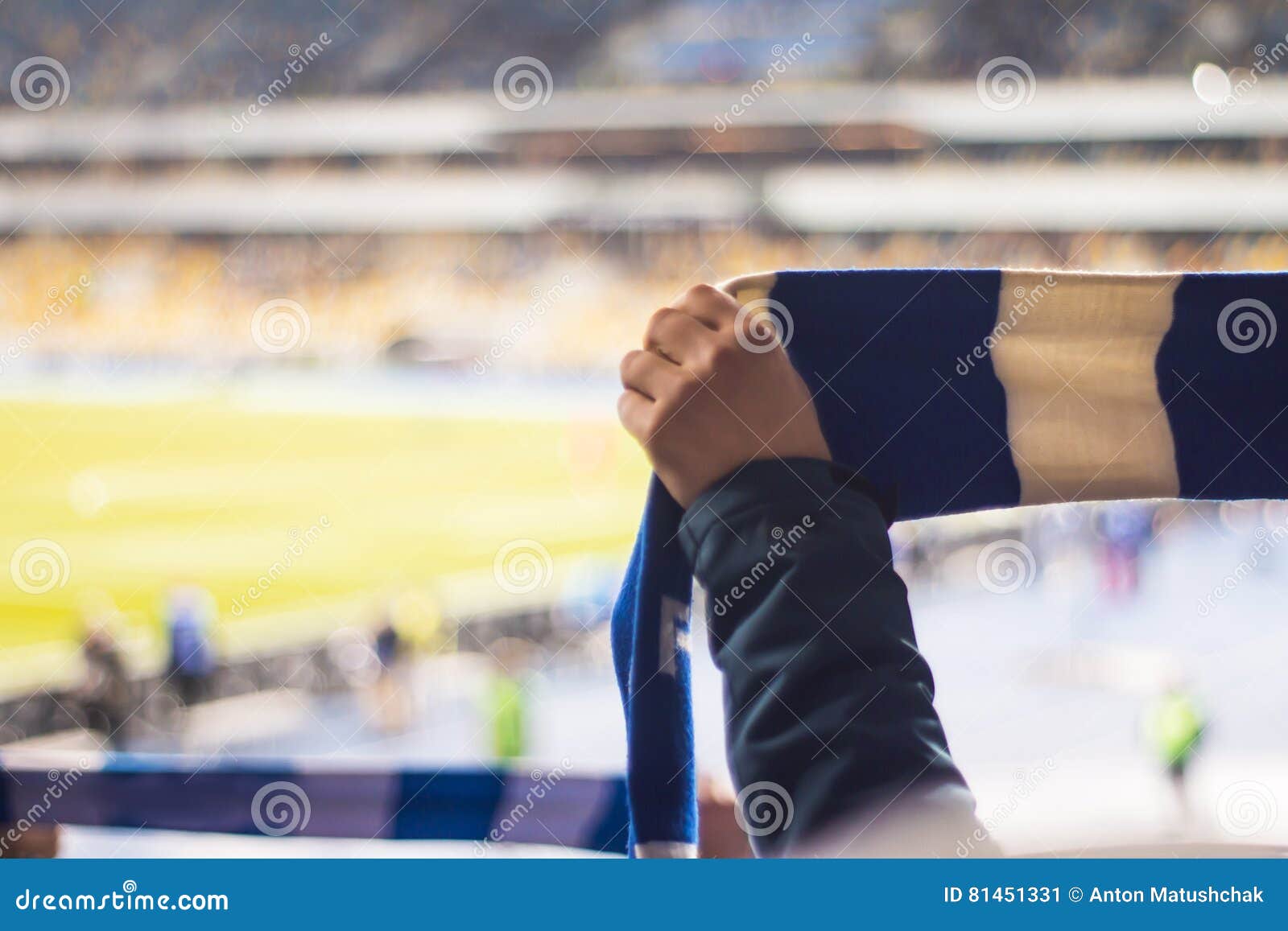 Fans in the Stadium Holding Flags of Their Football Team Stock Image ...