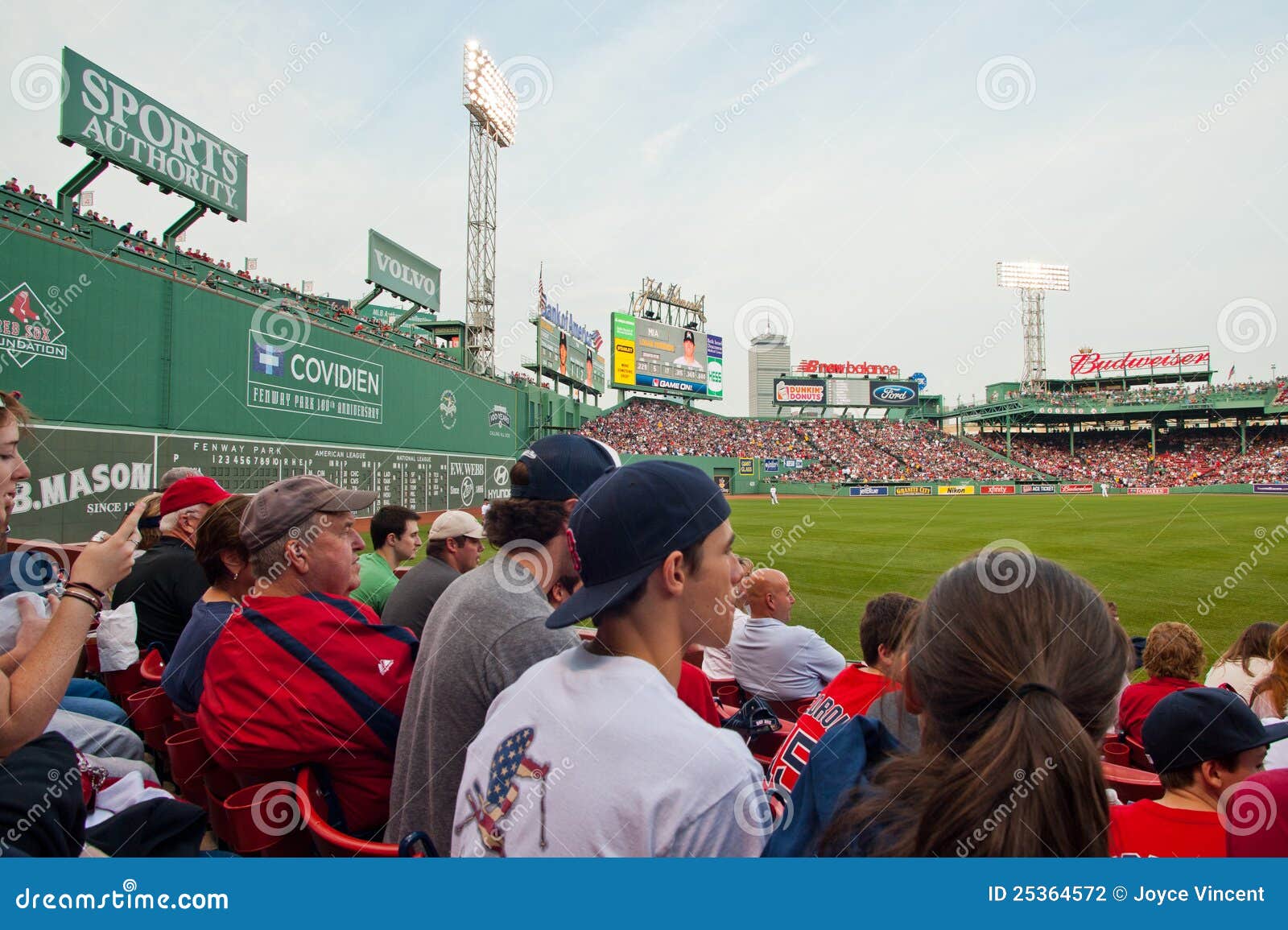 Fans watch a Red Sox game editorial photography. Image of miami - 25364572