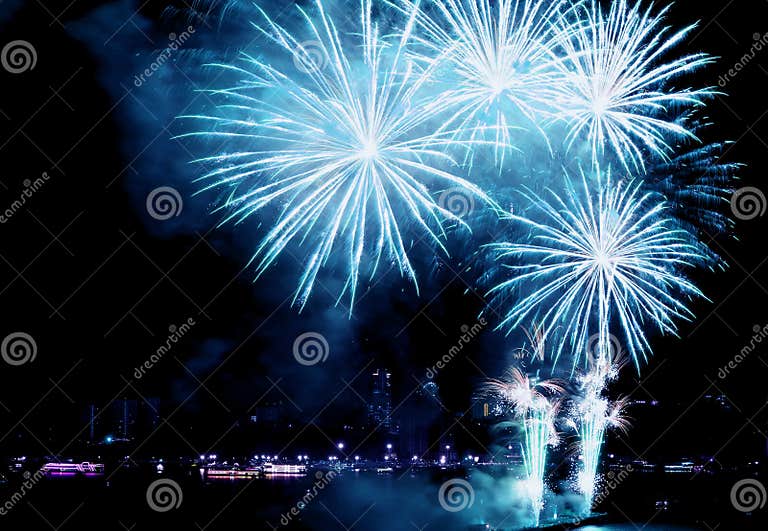 Fantastic Aqua Blue Color Fireworks Exploding in To the Night Sky Over ...