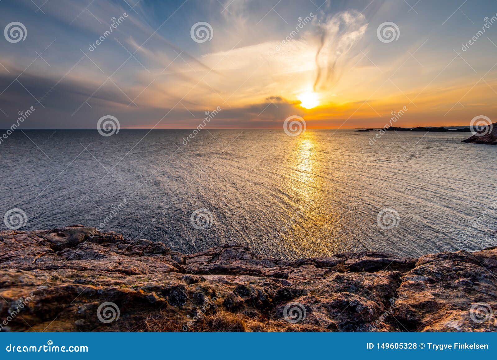 Fantastic, Cloudy Sunset Over the Sea Seen from a Cliff Stock Photo ...