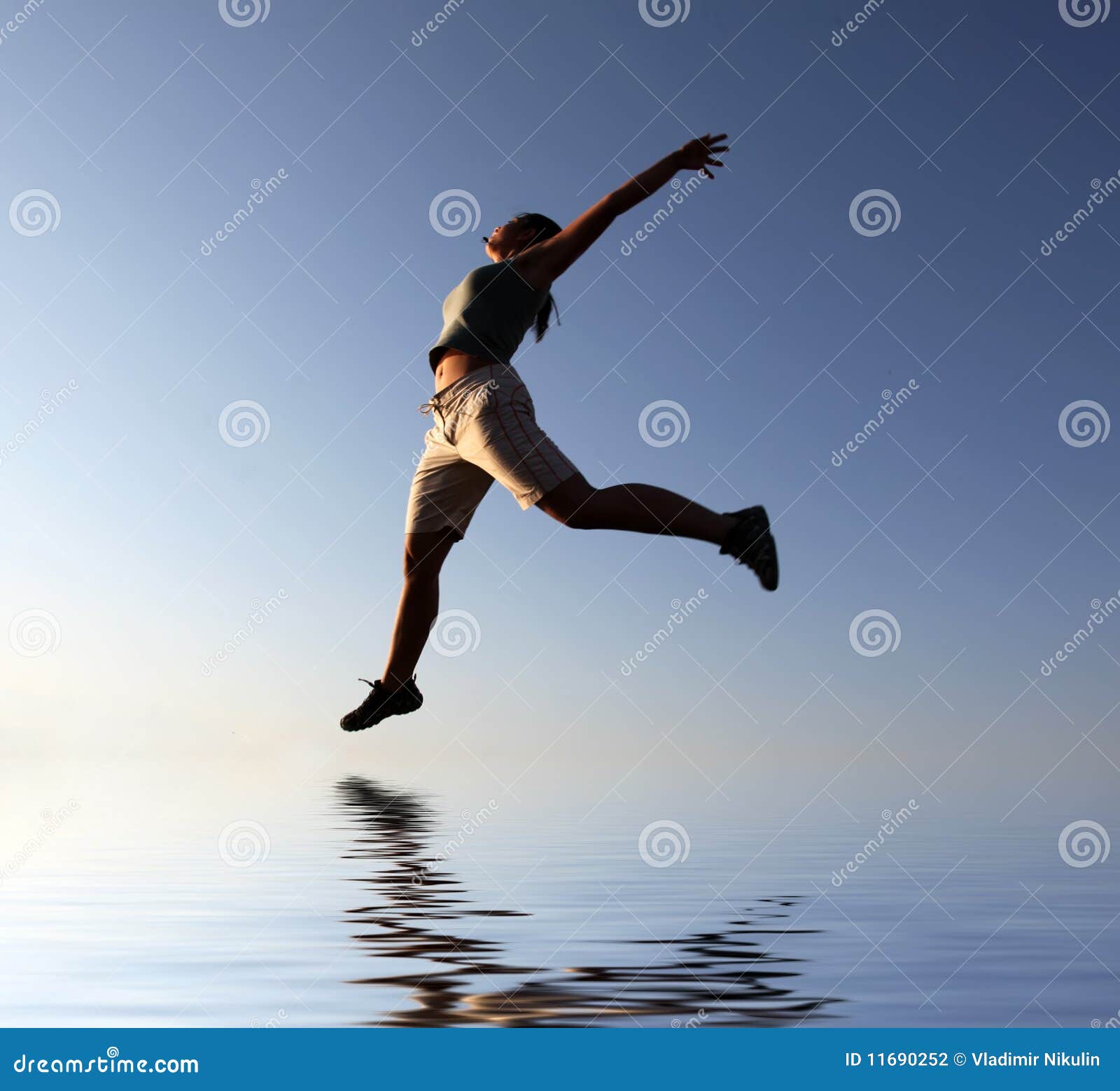 Fantastic Jumping Girl Over Water Stock Photo - Image of lifestyles ...