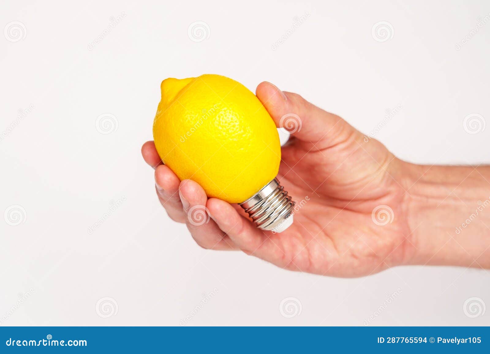 Fantastic Lemon Light Bulb in Hand on a White Background. Positive ...